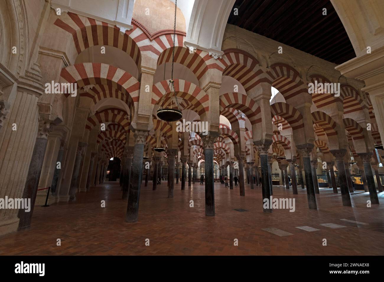 Mosque/ Cathedral of Cordoba Interior and high ceilings supporting a ...