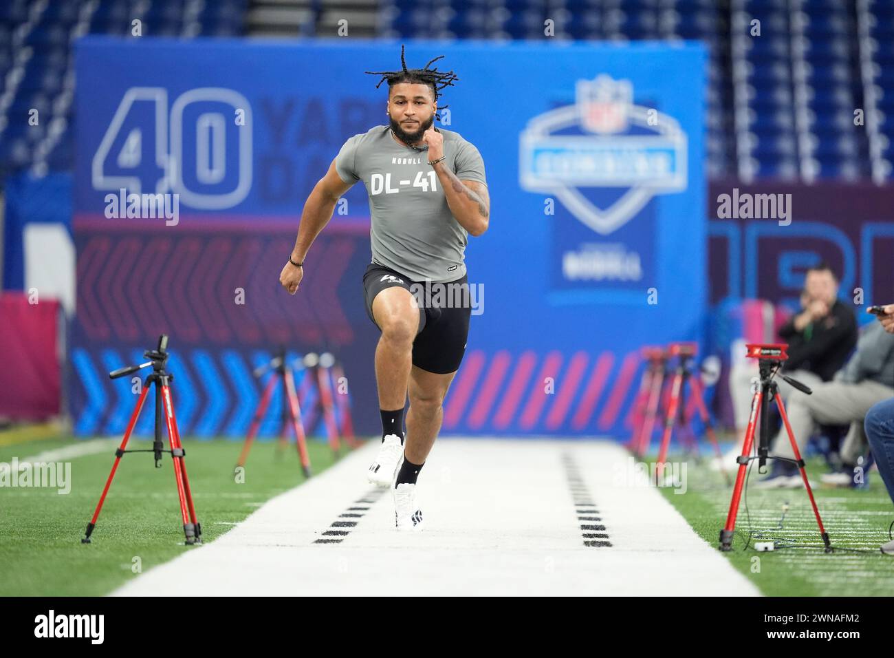 Western Michigan defensive lineman Marshawn Kneeland runs the 40-yard ...