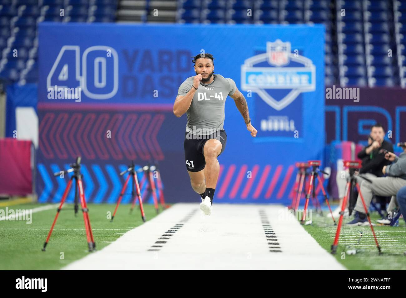 Western Michigan defensive lineman Marshawn Kneeland runs the 40-yard dash at the NFL football ...