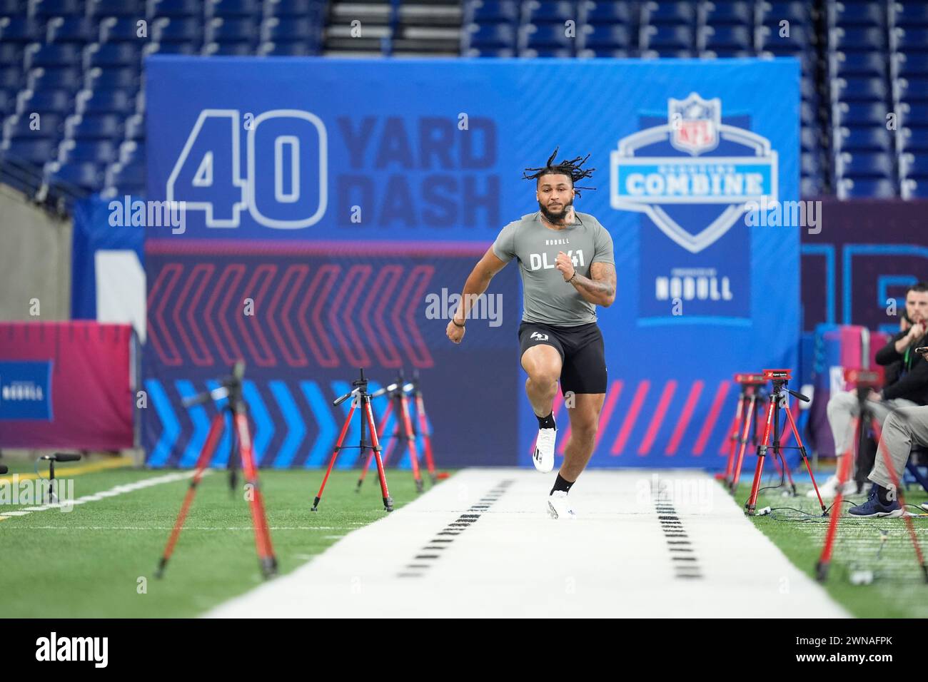 Western Michigan defensive lineman Marshawn Kneeland runs the 40-yard ...
