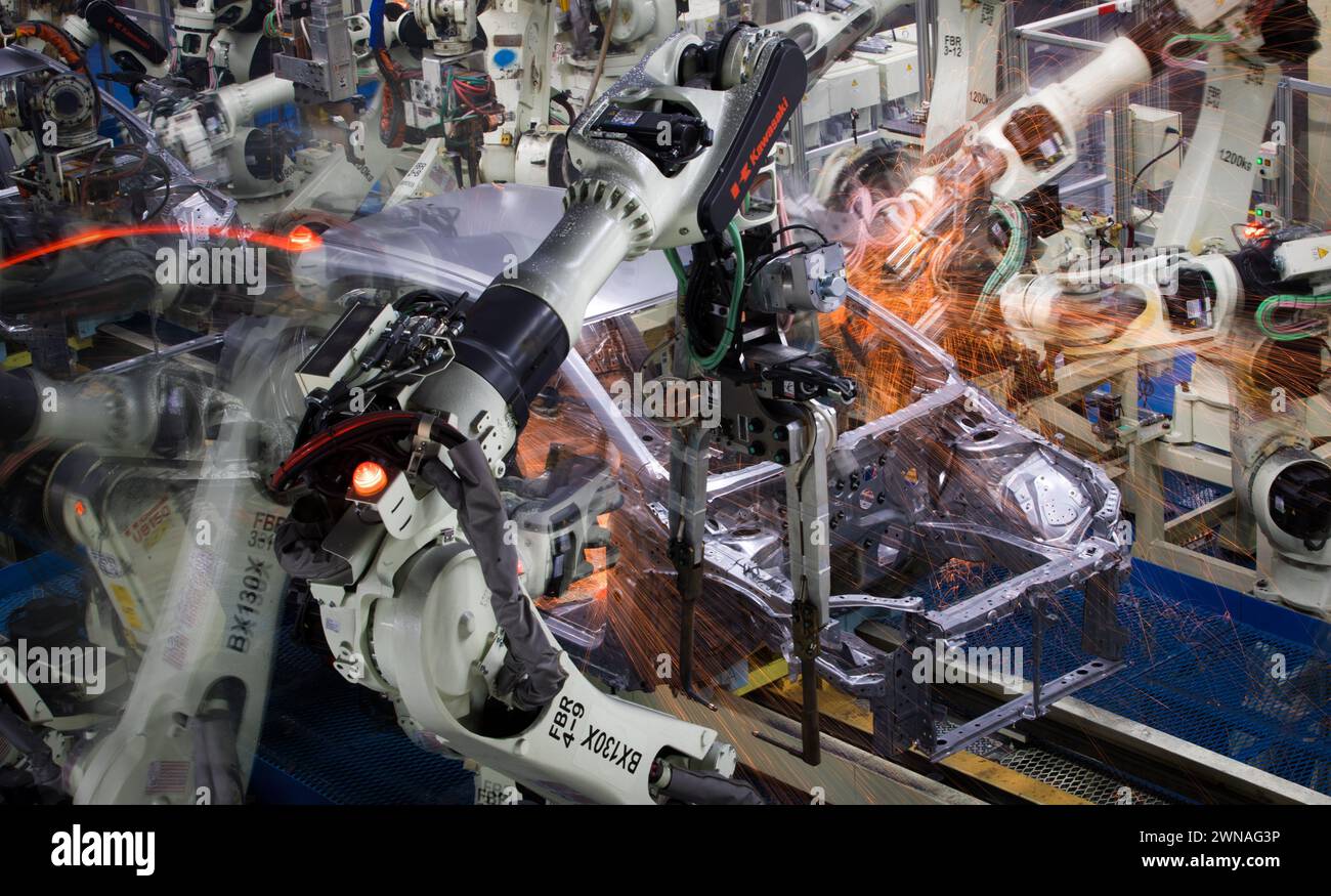 Sparks fly as robots weld Toyota Corolla bodyshells at Toyota's ...