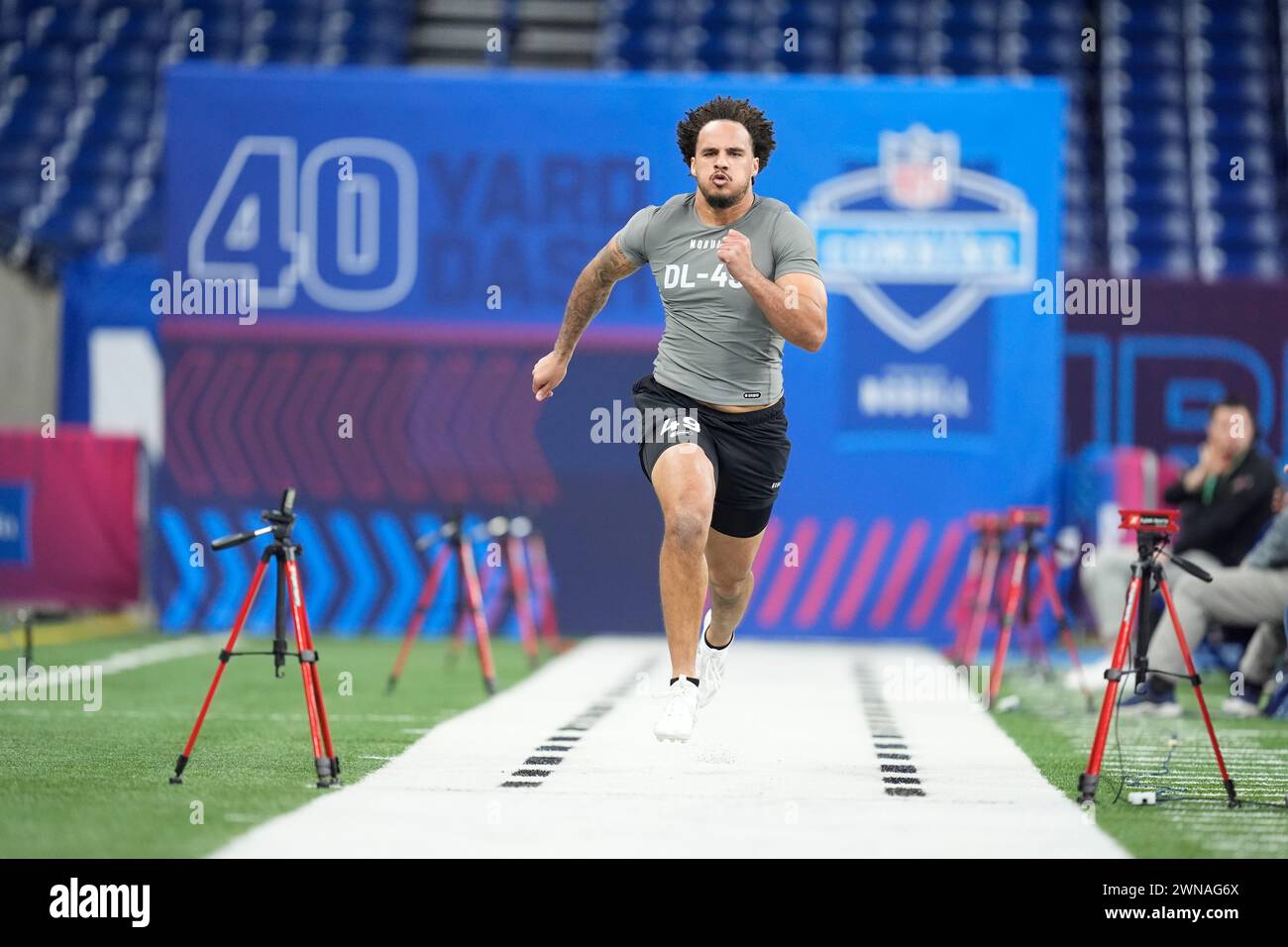 Washington defensive lineman Bralen Trice runs the 40-yard dash at the ...
