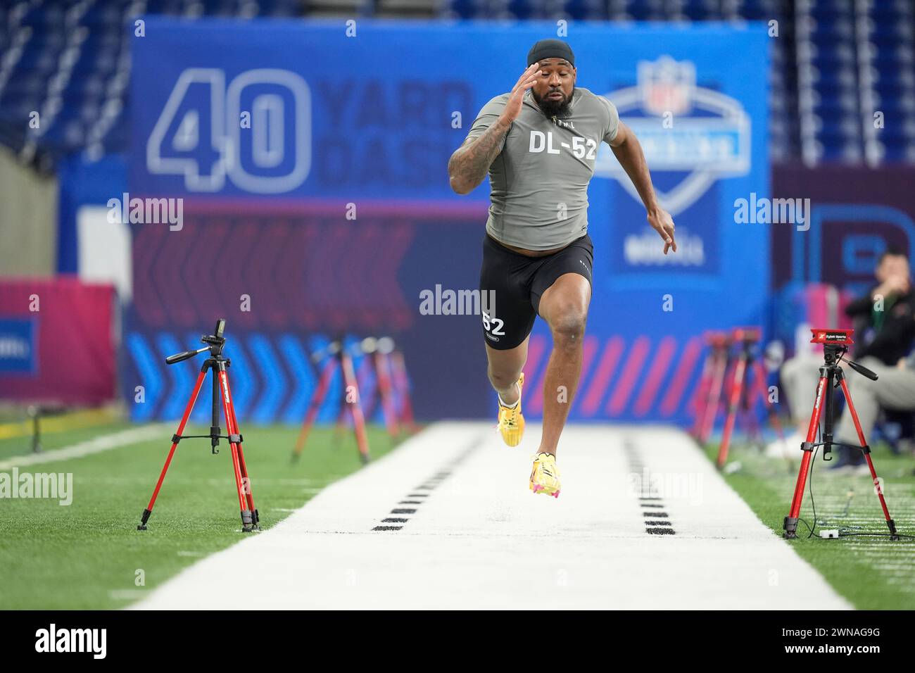 Connecticut defensive lineman Eric Watts runs the 40-yard dash at the ...