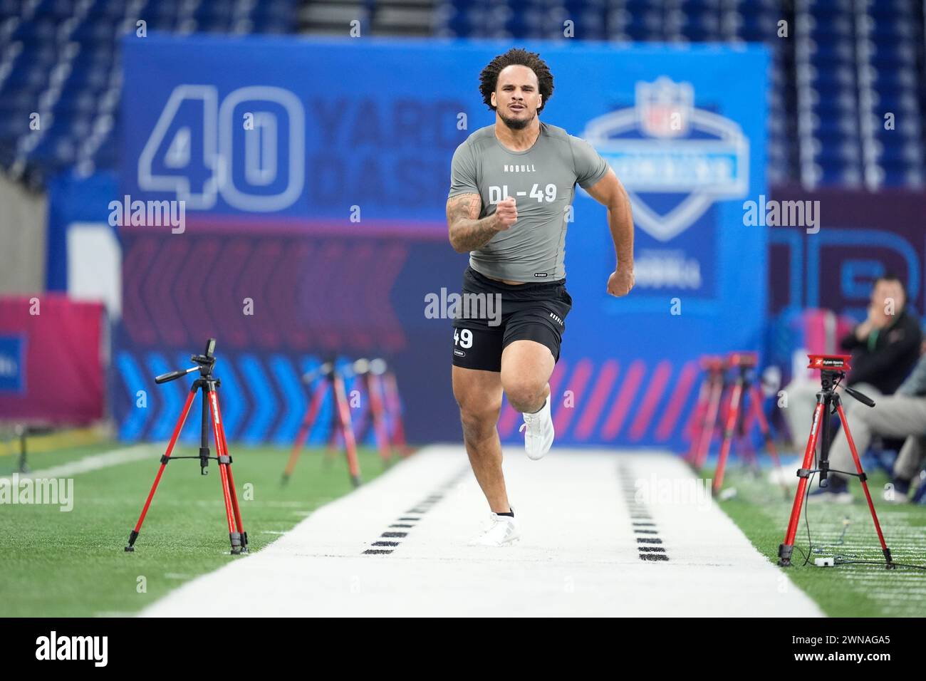 Washington defensive lineman Bralen Trice runs the 40-yard dash at the ...