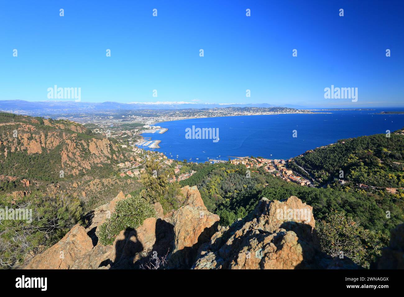 Top view above the coastline and the snowed mountain of the French ...