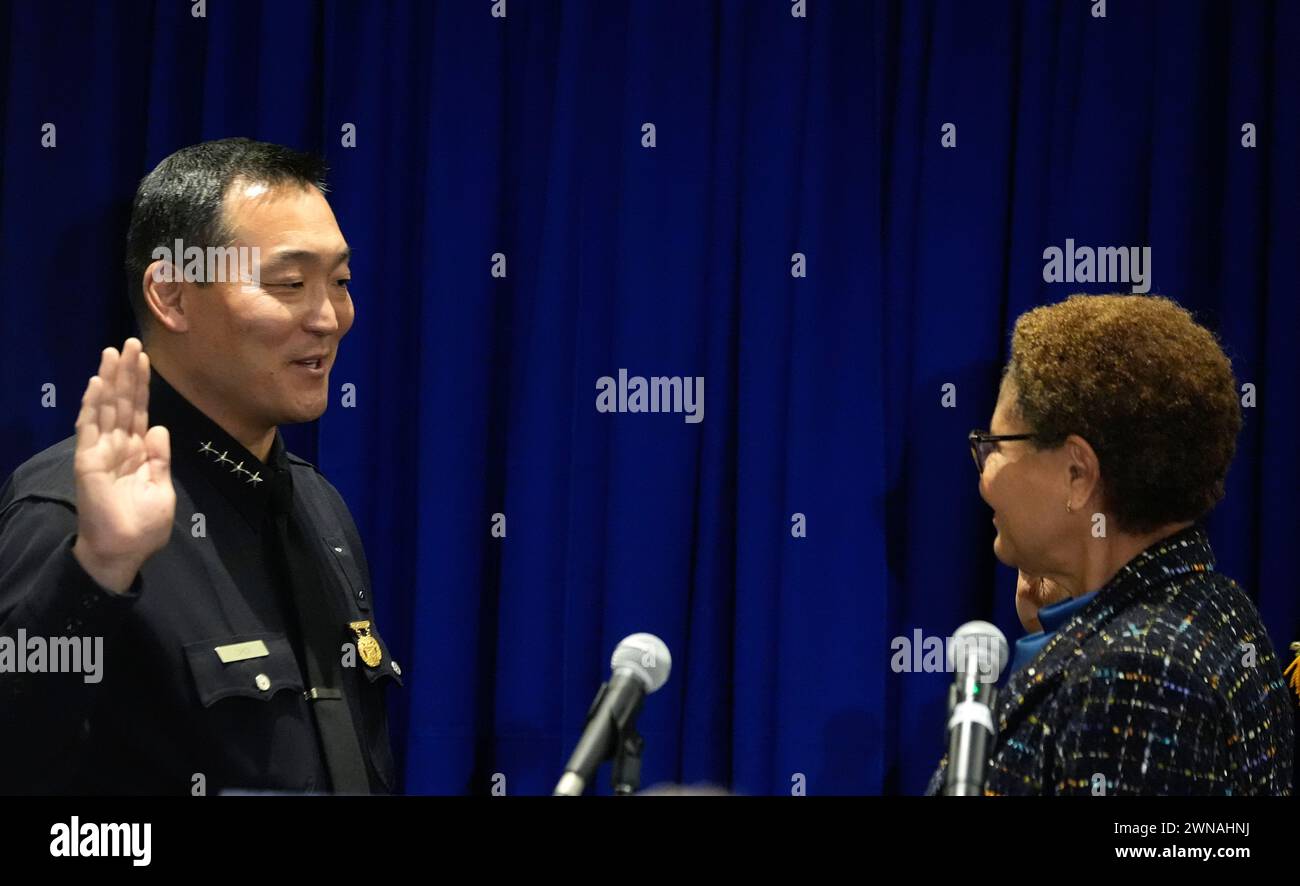 Chief Dominic H. Choi is sworn in by Los Angeles Mayor Karen Bass as ...