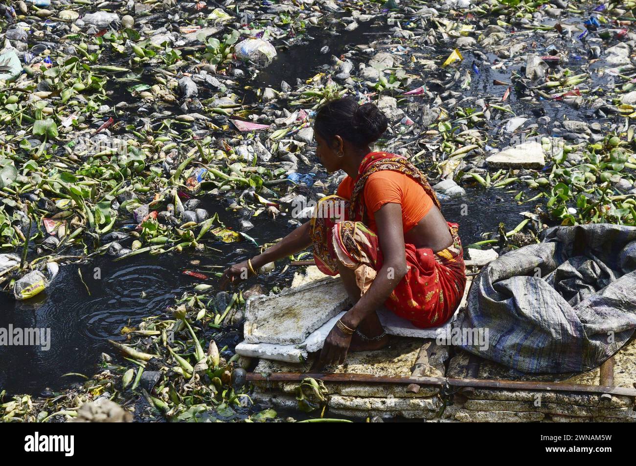 Guwahati, Guwahati, India. 29th Feb, 2024. A woman rag picker ...