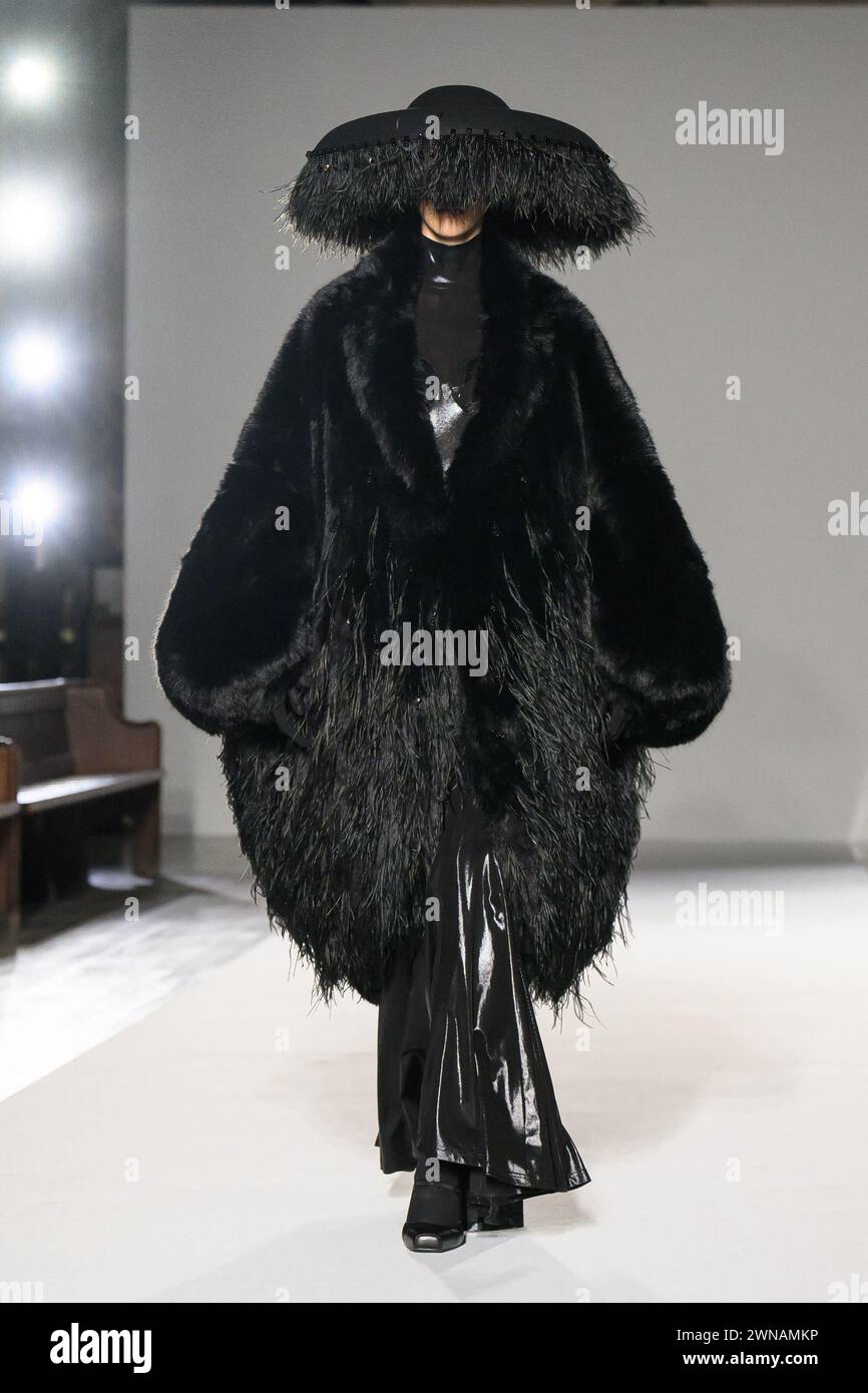 A model Walks the runway during the Chen Peng Womenswear Fall/Winter ...