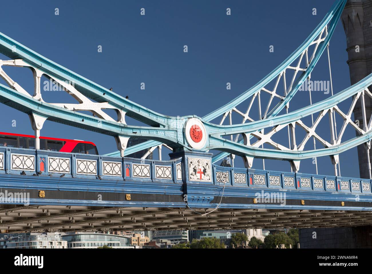 UK, London, Details of the iron work on Tower ridge with red bus Stock ...