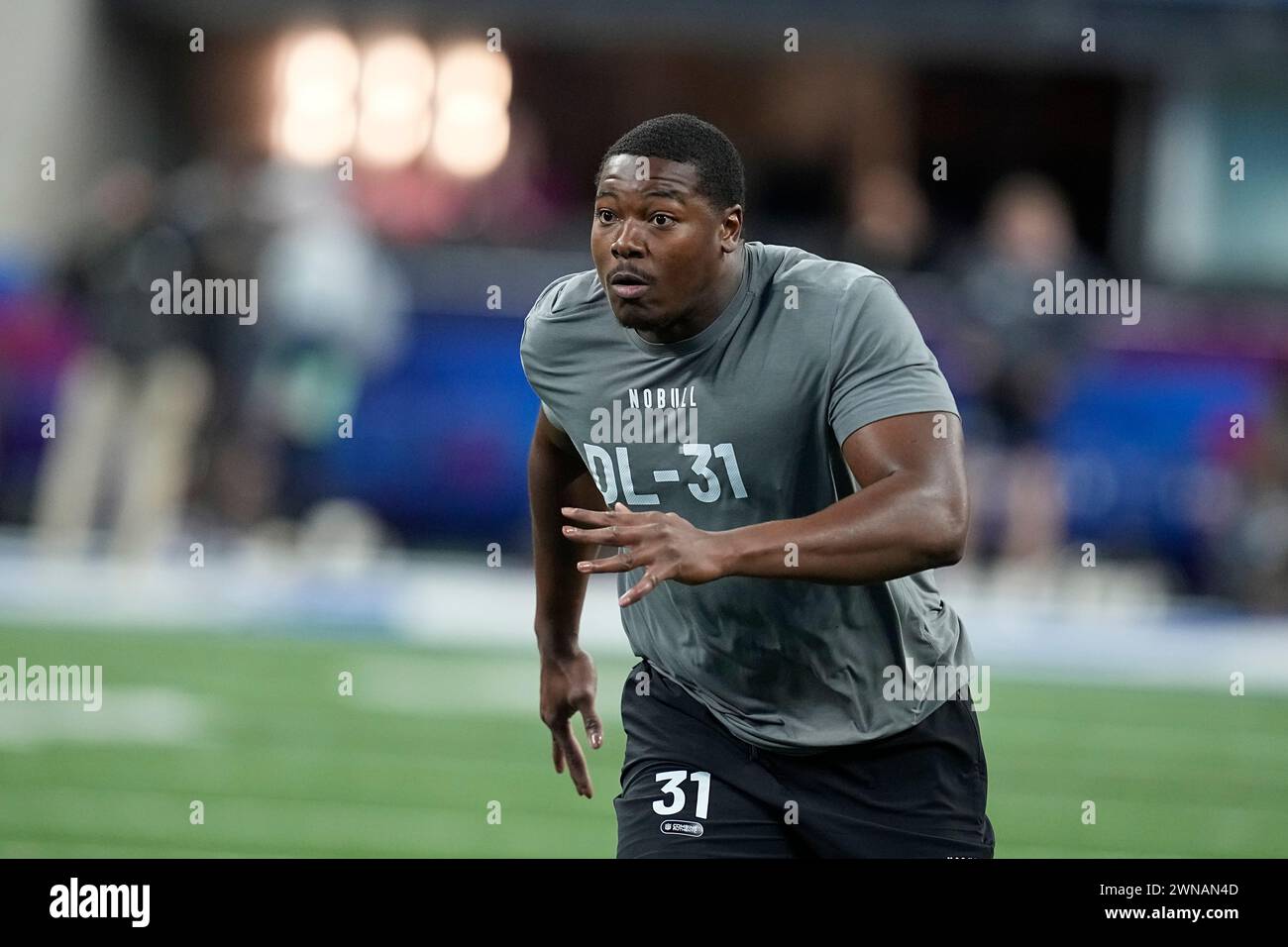 Texas Tech defensive lineman Myles Cole runs a drill at the NFL ...