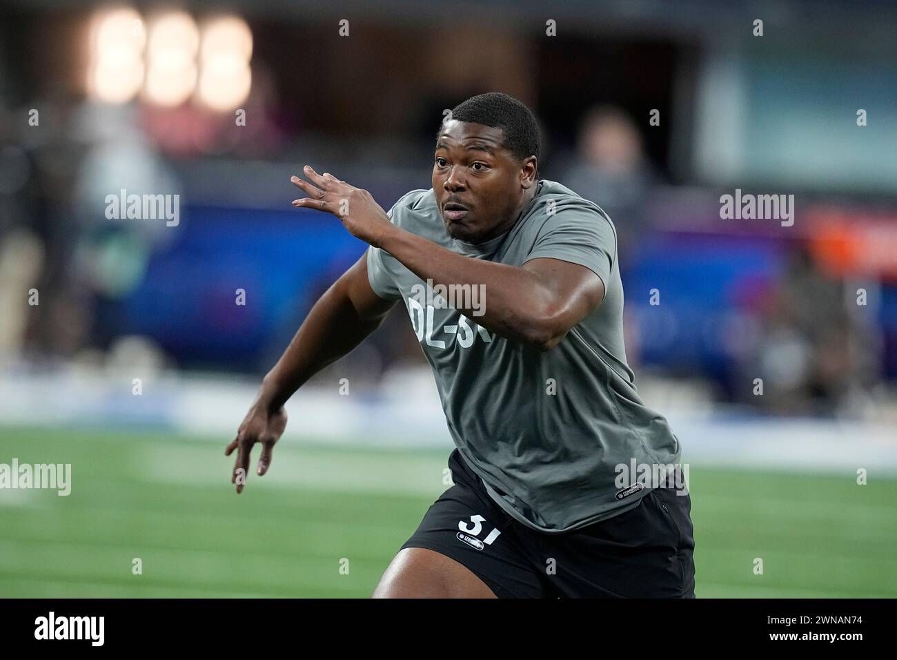 Texas Tech defensive lineman Myles Cole runs a drill at the NFL ...