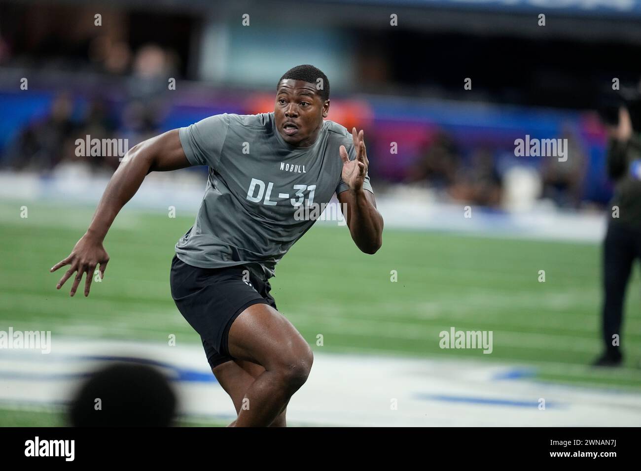 Texas Tech defensive lineman Myles Cole runs a drill at the NFL ...
