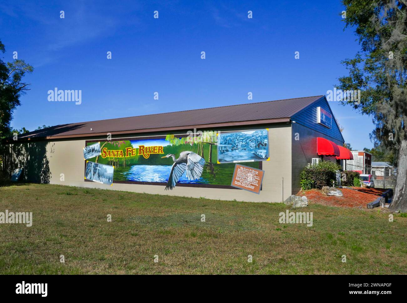 Mural of the local Santa Fe River painted on the side of a building in ...
