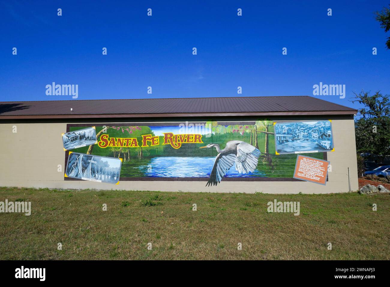 Mural of the local Santa Fe River painted on the side of a building in ...
