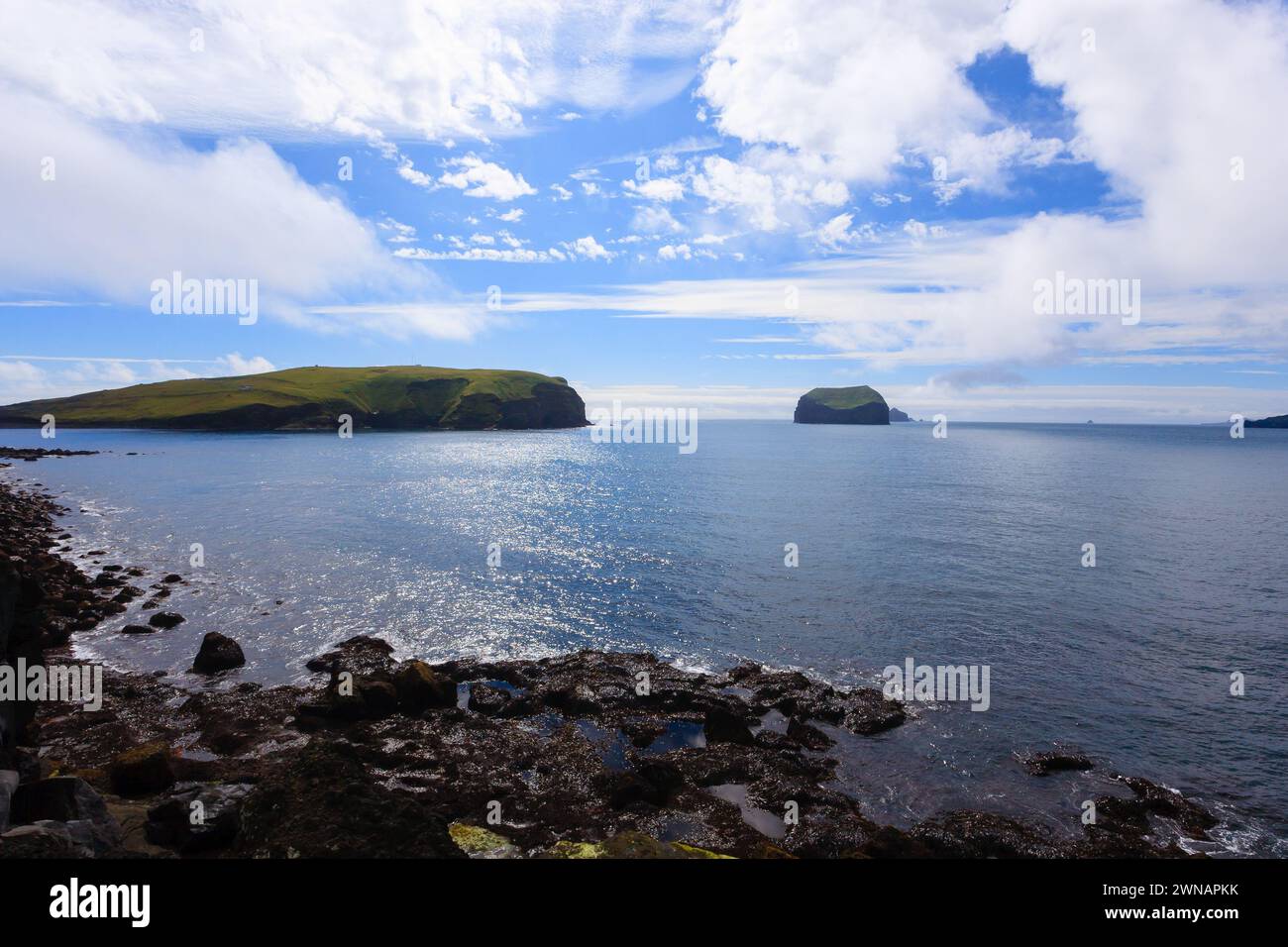Vestmannaeyjar island beach view with Surtsey island in background ...