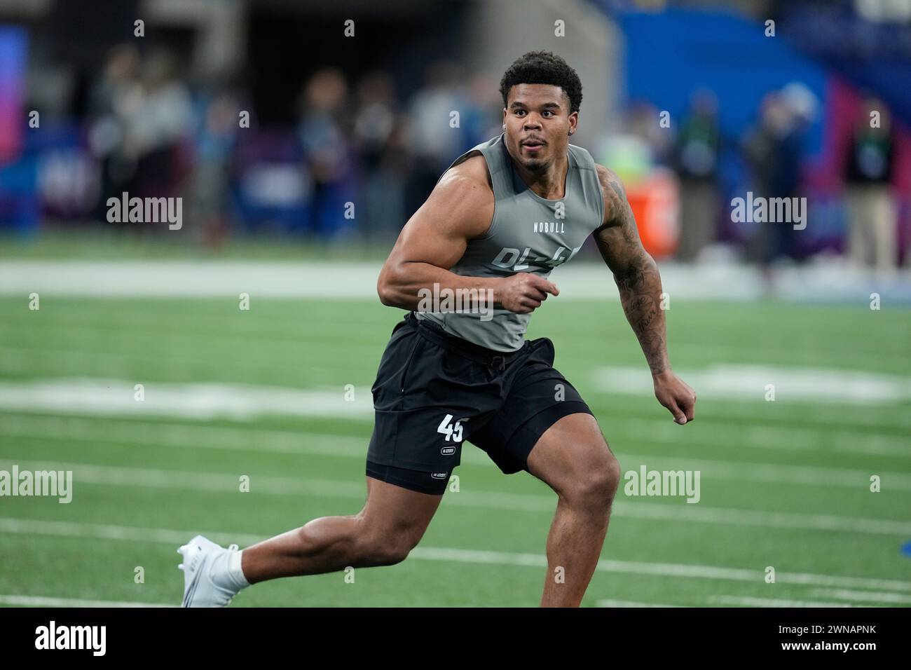 Penn State defensive lineman Chop Robinson runs a drill at the NFL ...