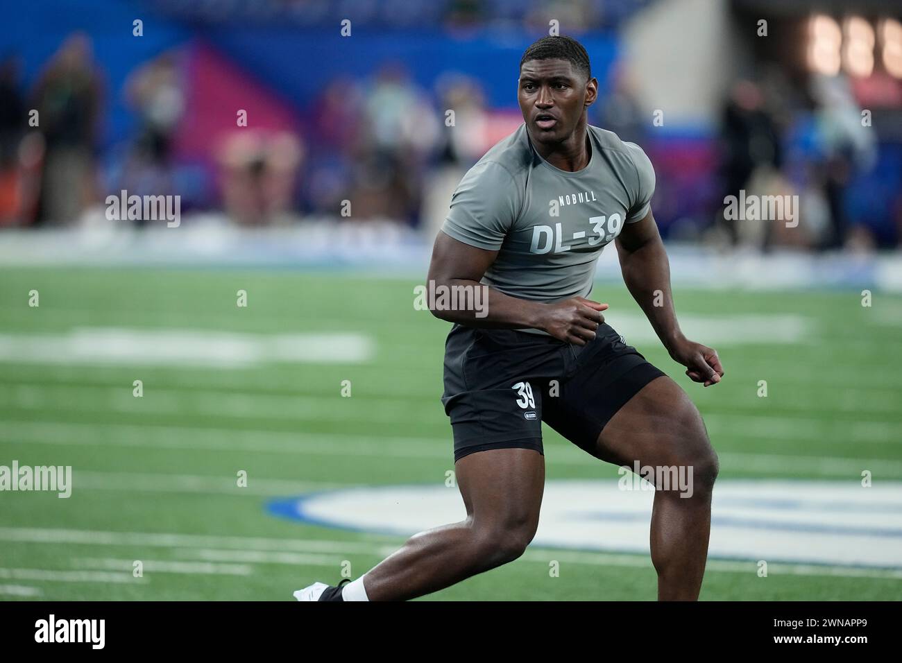 Mississippi defensive lineman Cedric Johnson runs a drill at the NFL ...