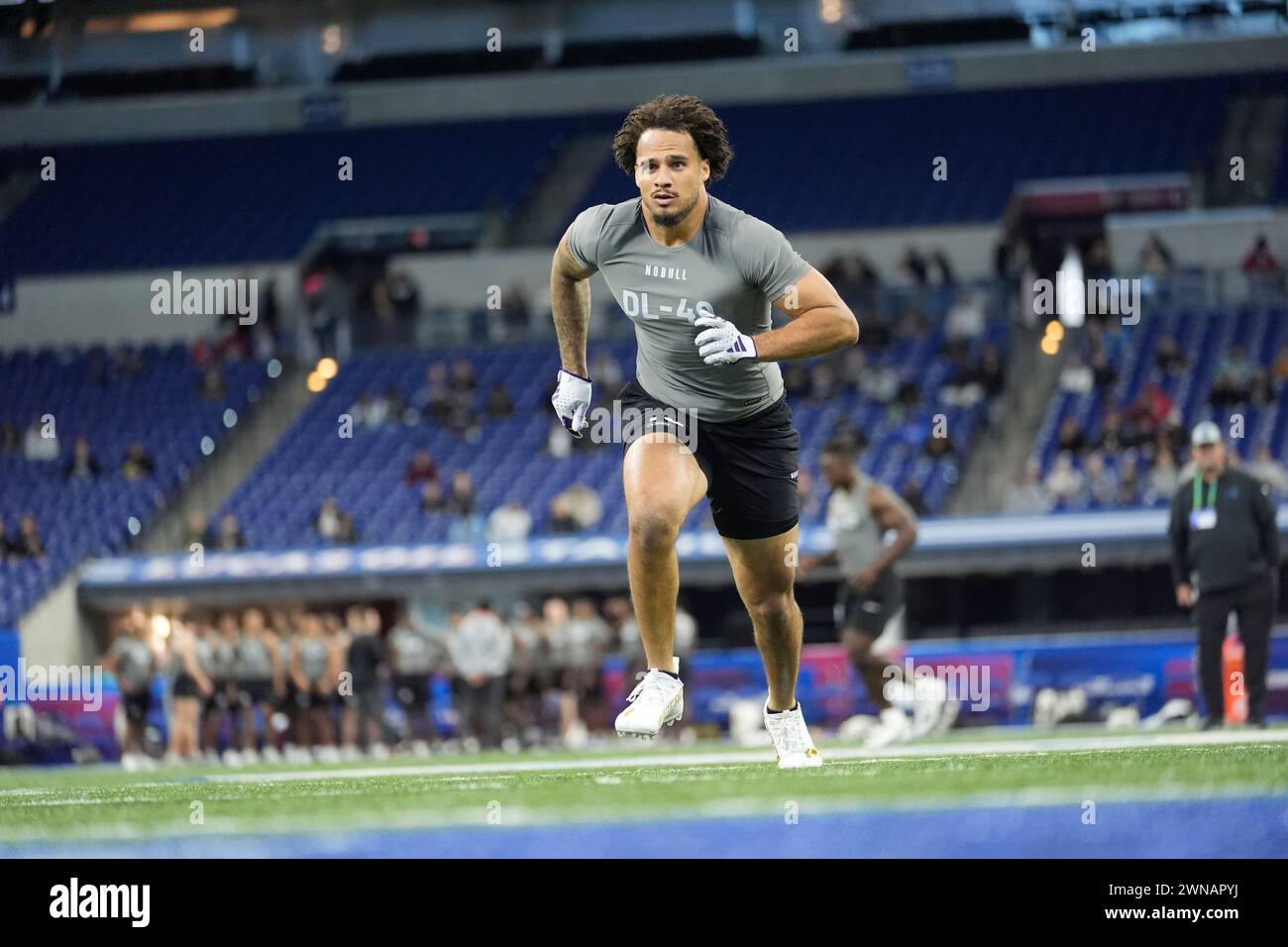 Washington defensive lineman Bralen Trice runs a drill at the NFL ...