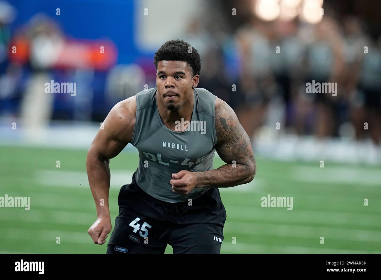 Penn State defensive lineman Chop Robinson runs a drill at the NFL ...