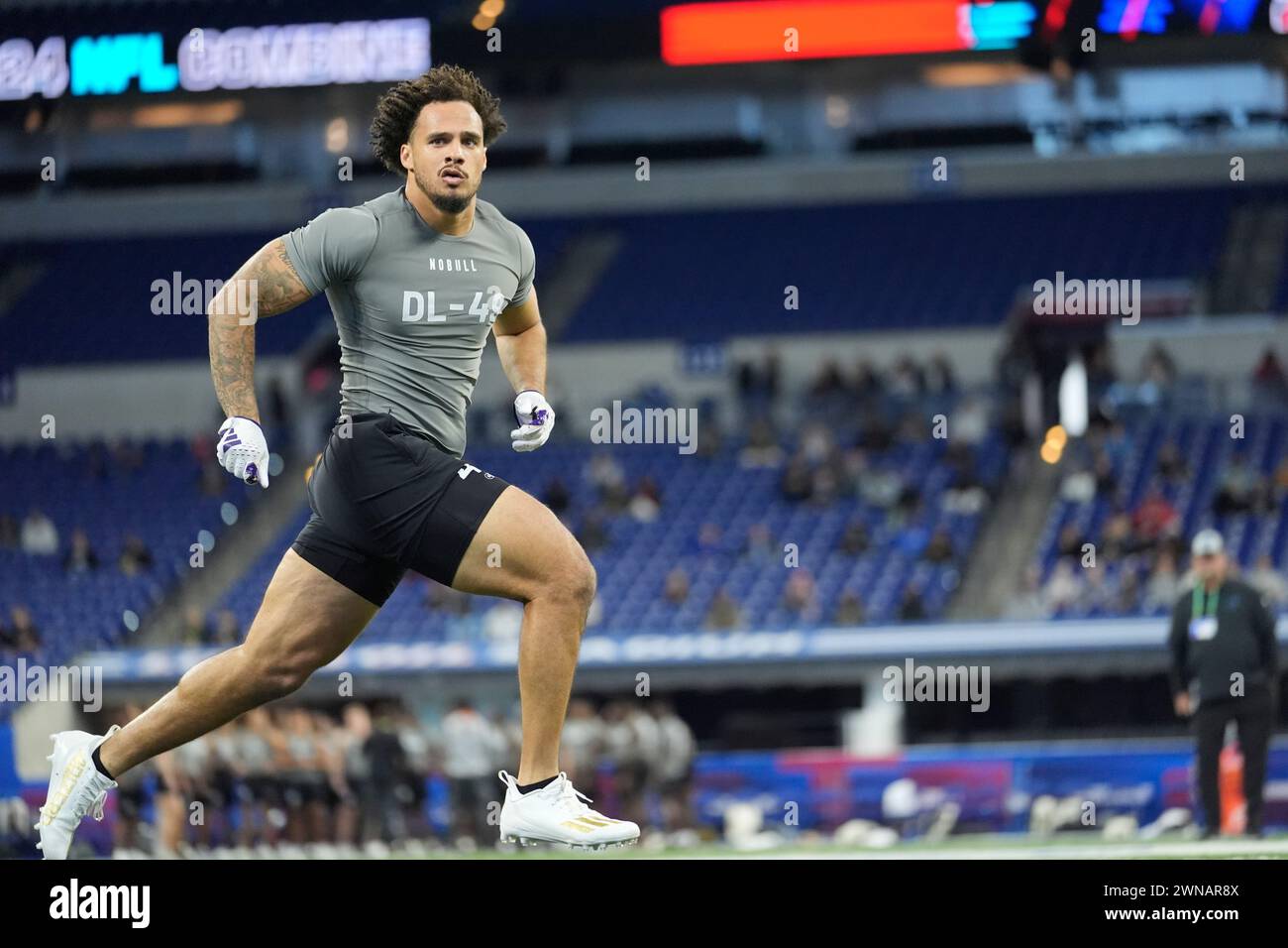 Washington defensive lineman Bralen Trice runs a drill at the NFL ...