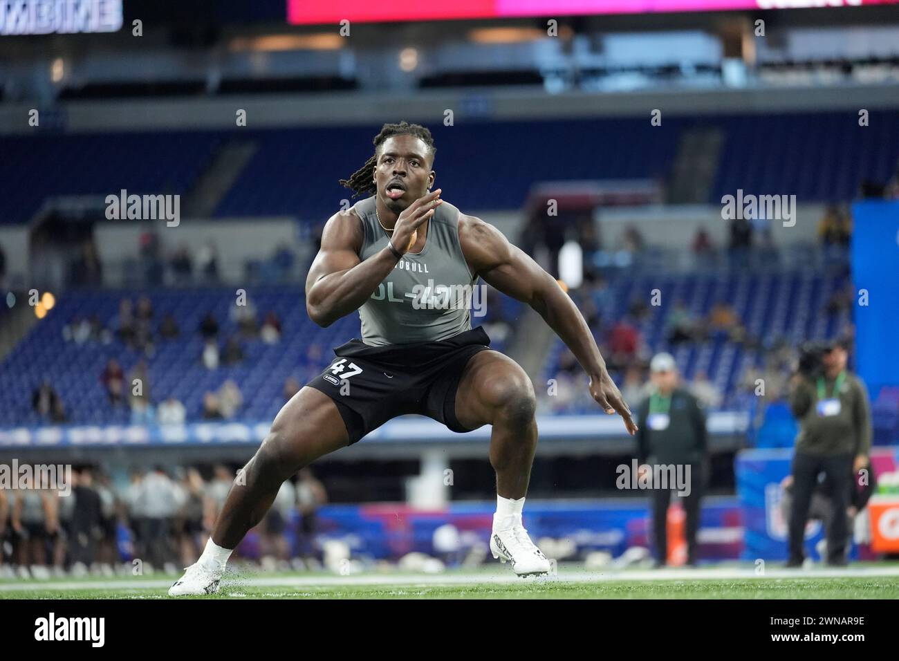 Troy defensive lineman Javon Solomon runs a drill at the NFL football ...