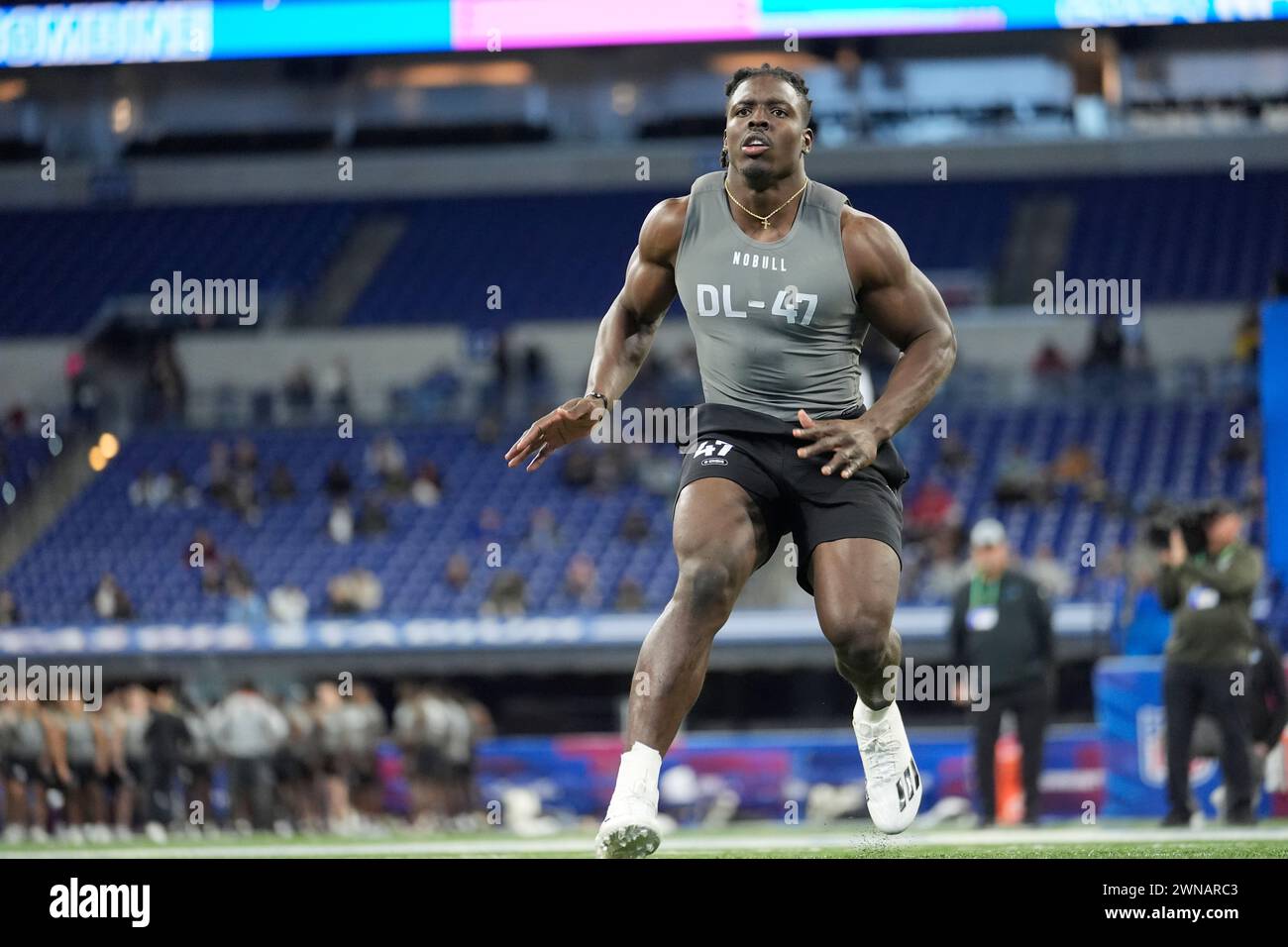 Troy defensive lineman Javon Solomon runs a drill at the NFL football ...