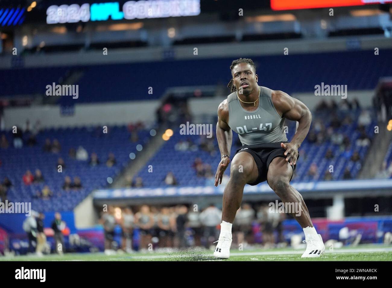 Troy defensive lineman Javon Solomon runs a drill at the NFL football ...