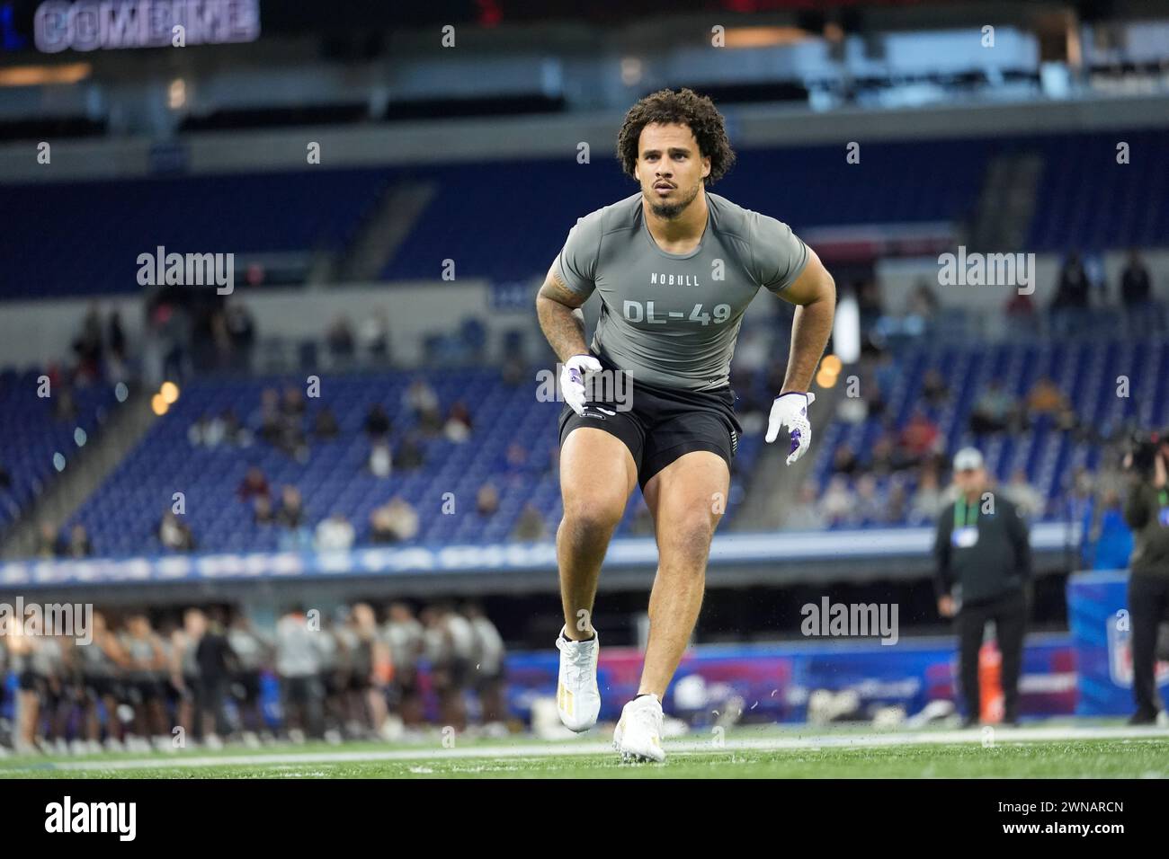 Washington defensive lineman Bralen Trice runs a drill at the NFL ...