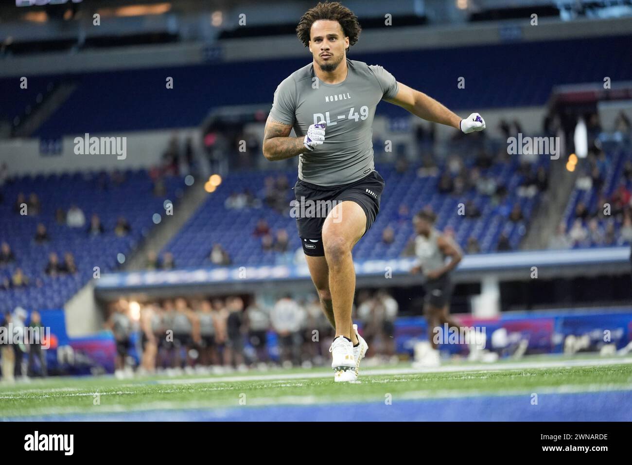 Washington defensive lineman Bralen Trice runs a drill at the NFL ...