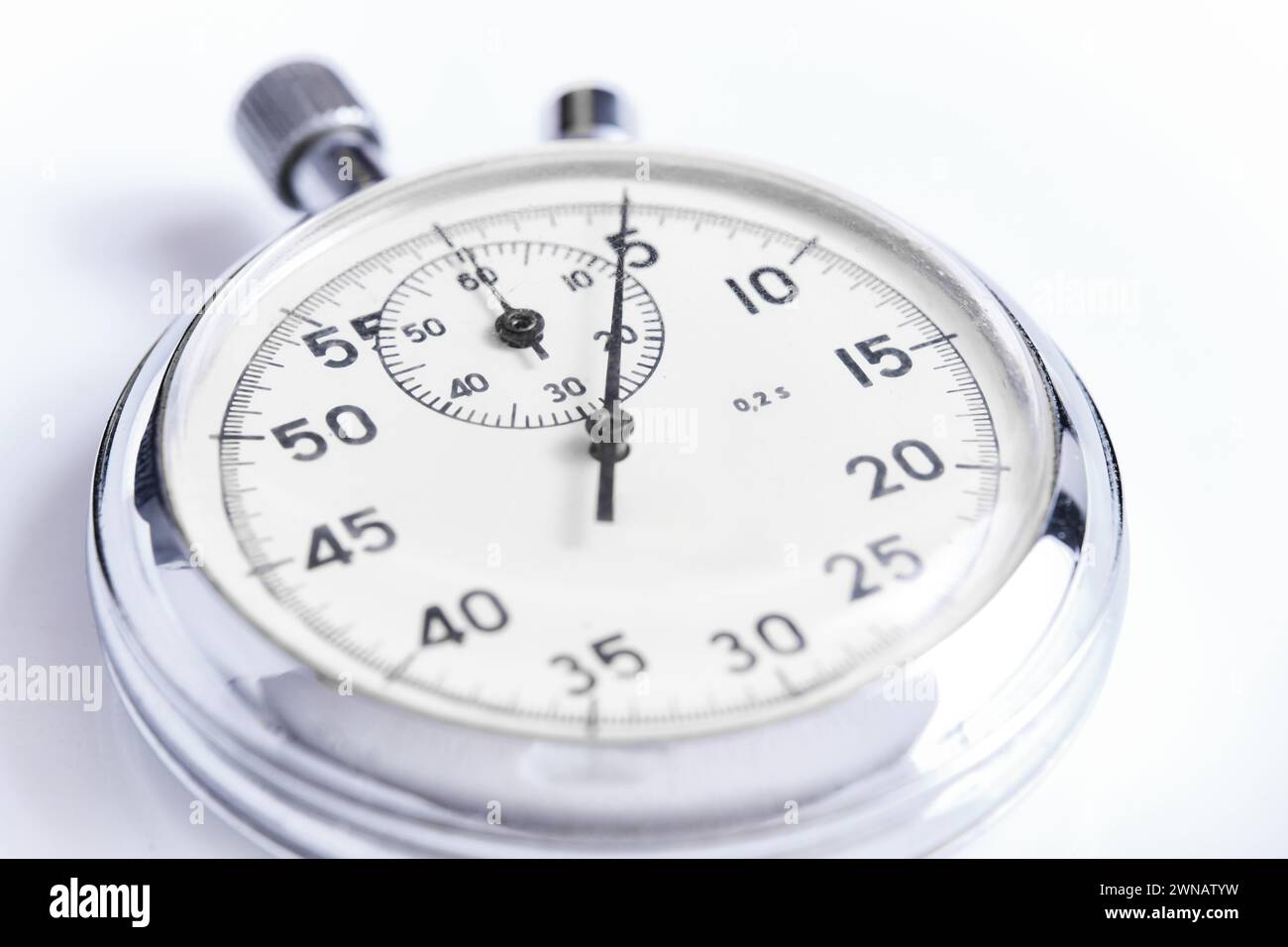 Mechanical stopwatch white background closeup Stock Photo - Alamy