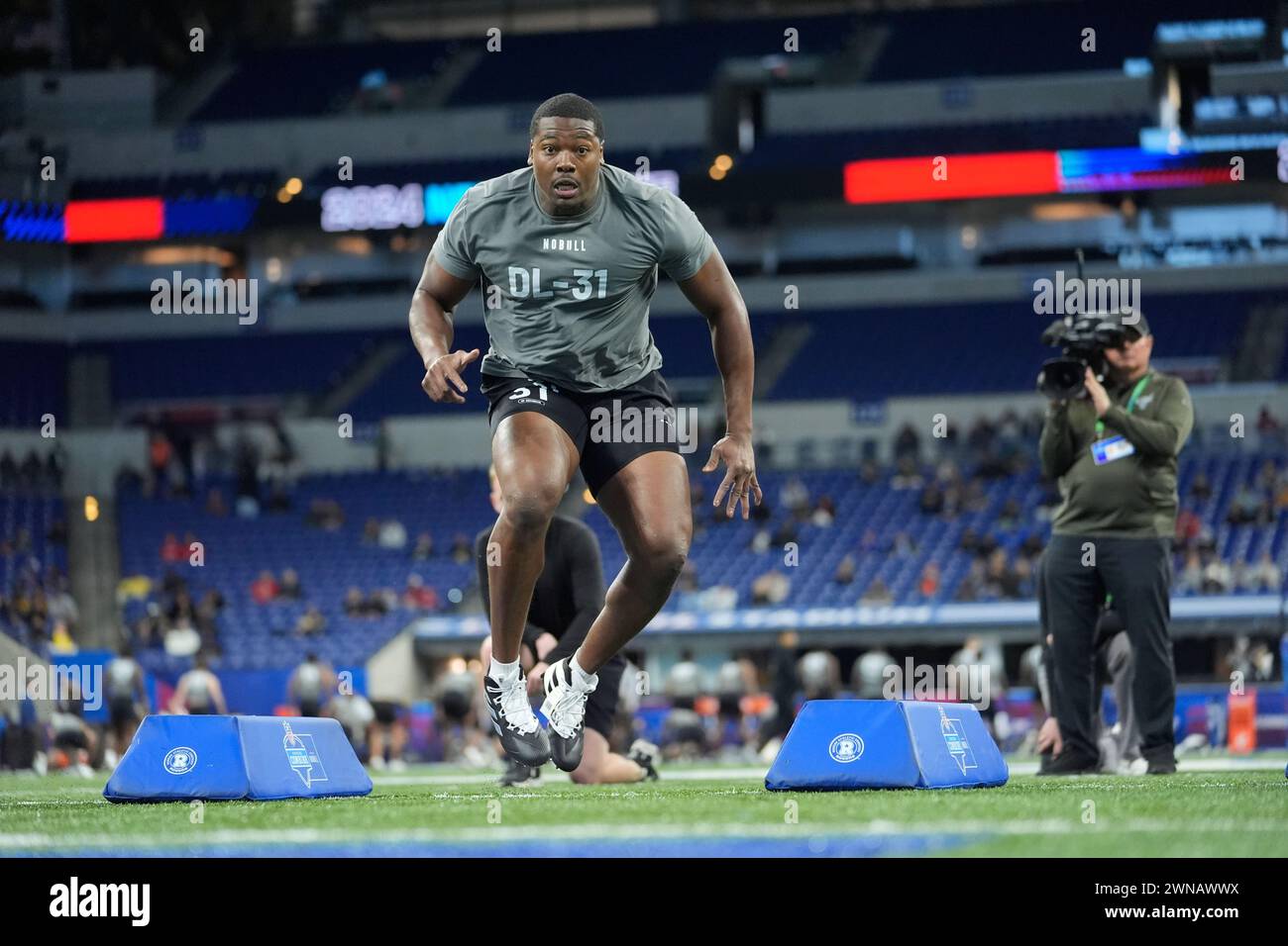 Texas Tech defensive lineman Myles Cole runs a drill at the NFL ...
