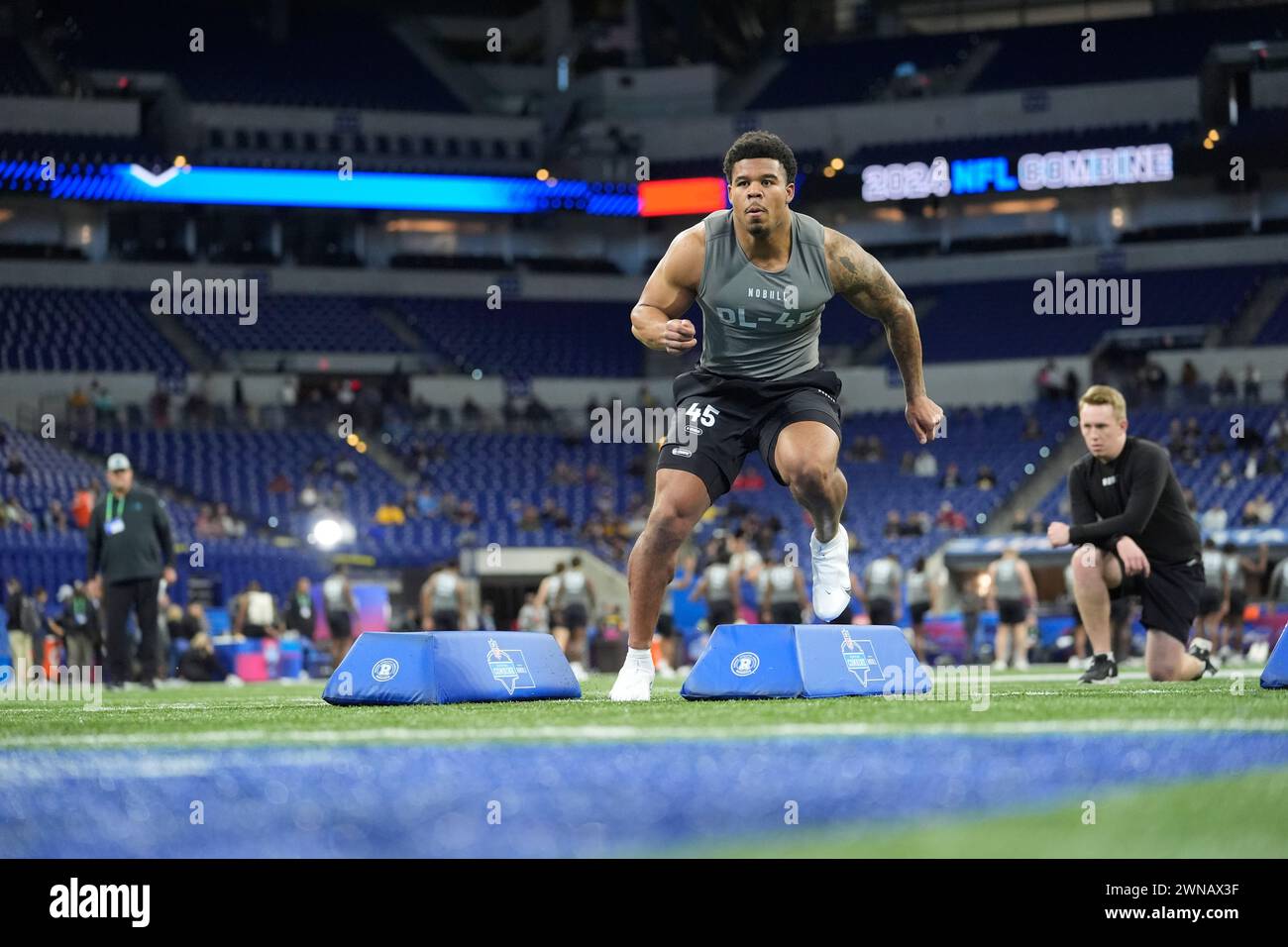 Penn State defensive lineman Chop Robinson runs a drill at the NFL ...