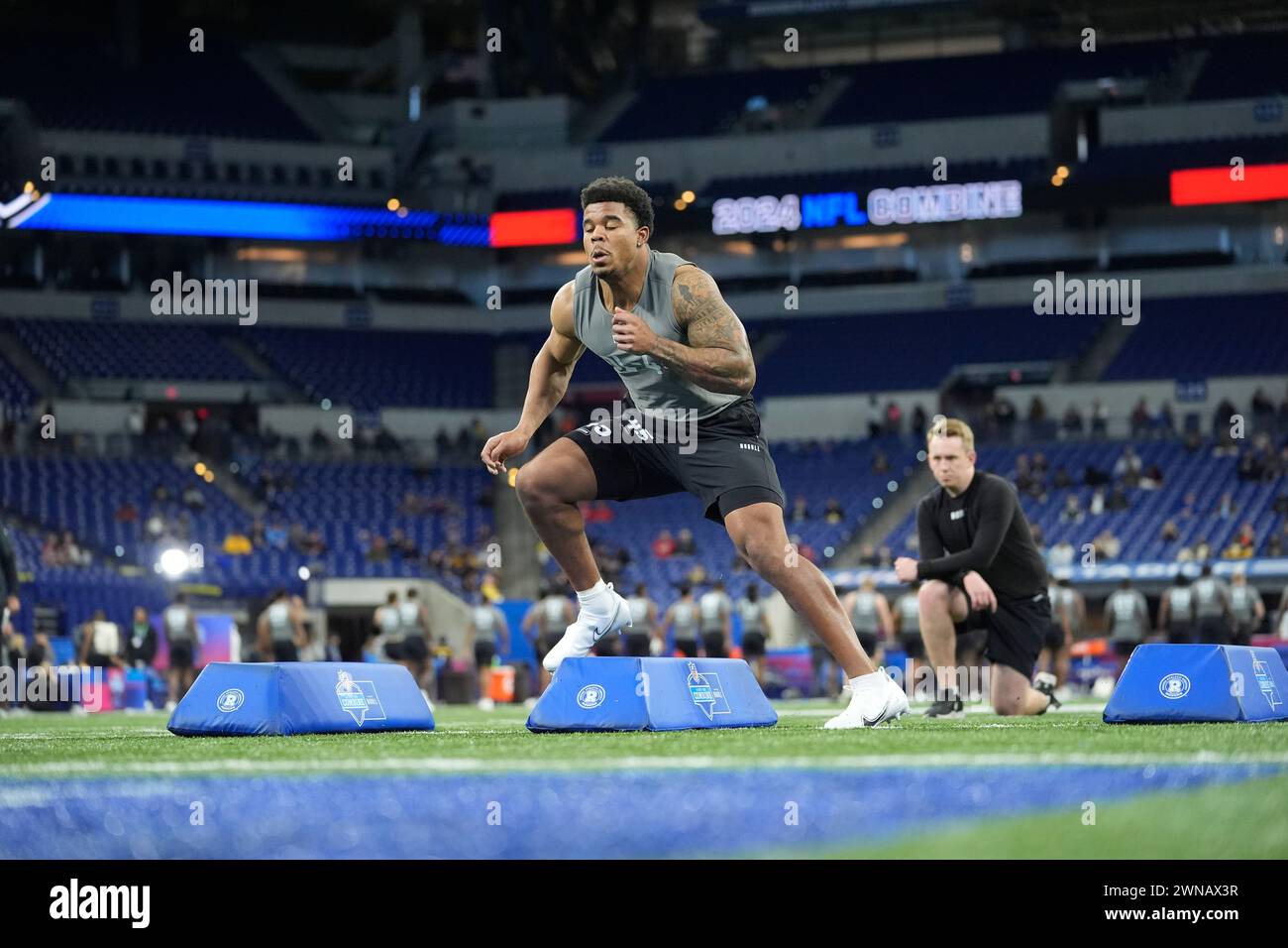 Penn State defensive lineman Chop Robinson runs a drill at the NFL ...