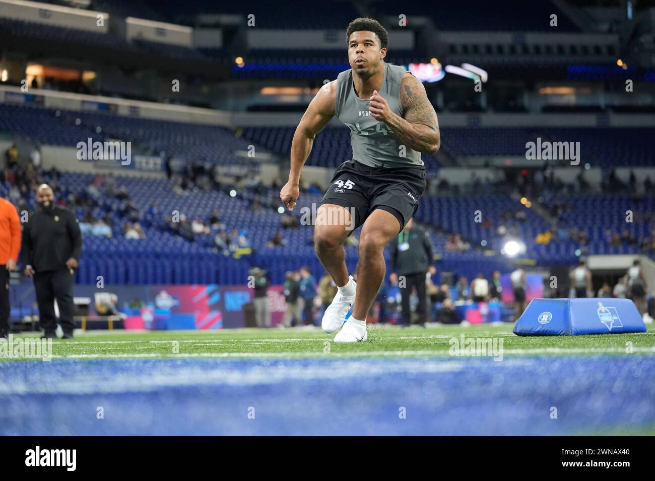 Penn State defensive lineman Chop Robinson runs a drill at the NFL ...