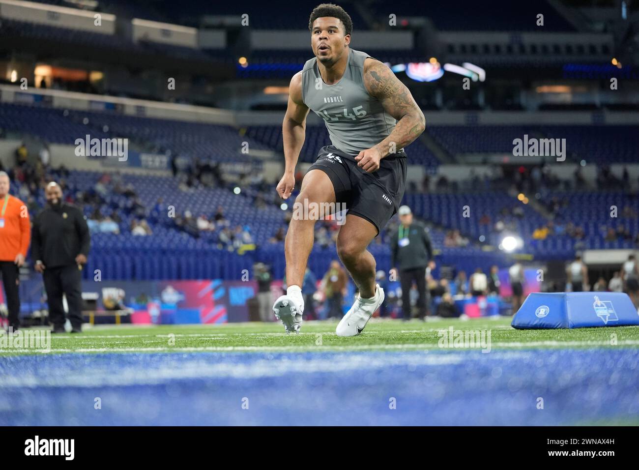 Penn State defensive lineman Chop Robinson runs a drill at the NFL ...