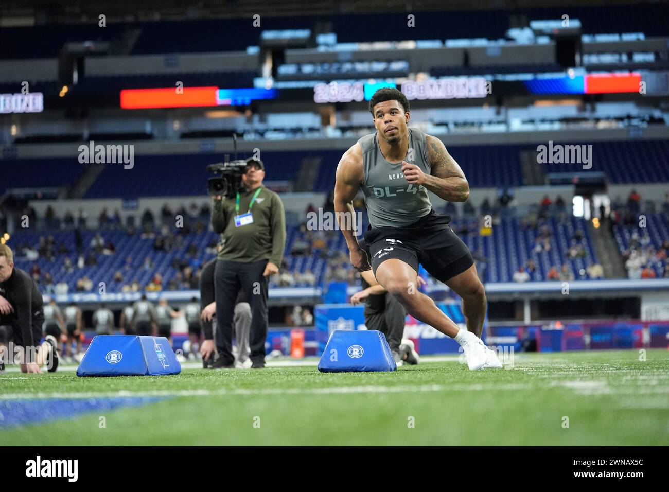 Penn State defensive lineman Chop Robinson runs a drill at the NFL ...