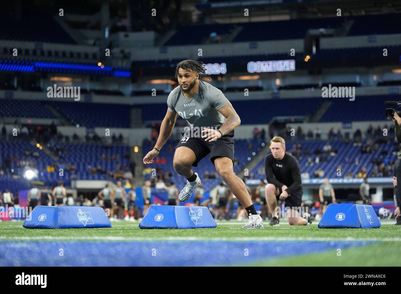 Western Michigan defensive lineman Marshawn Kneeland runs a drill at ...