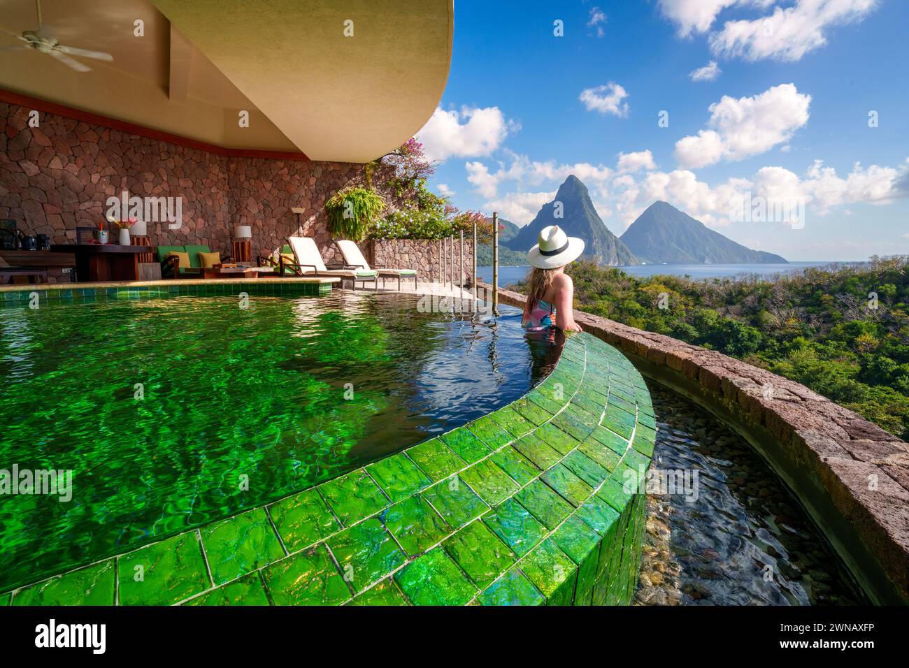 Woman enjoying the view from her private Infinity in room Pool, Jade ...
