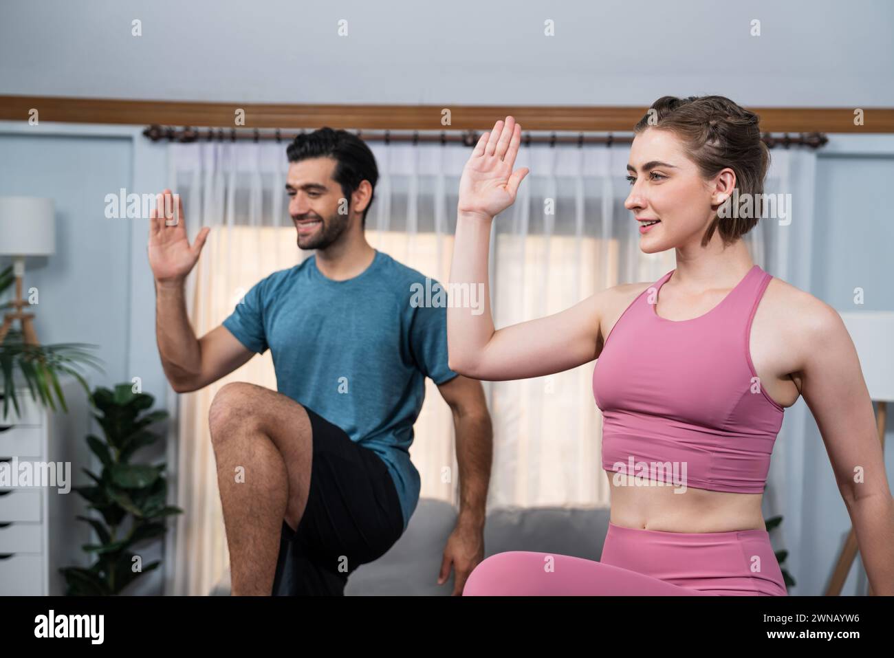 Athletic and sporty fitness couple or exercise buddy running posture at ...