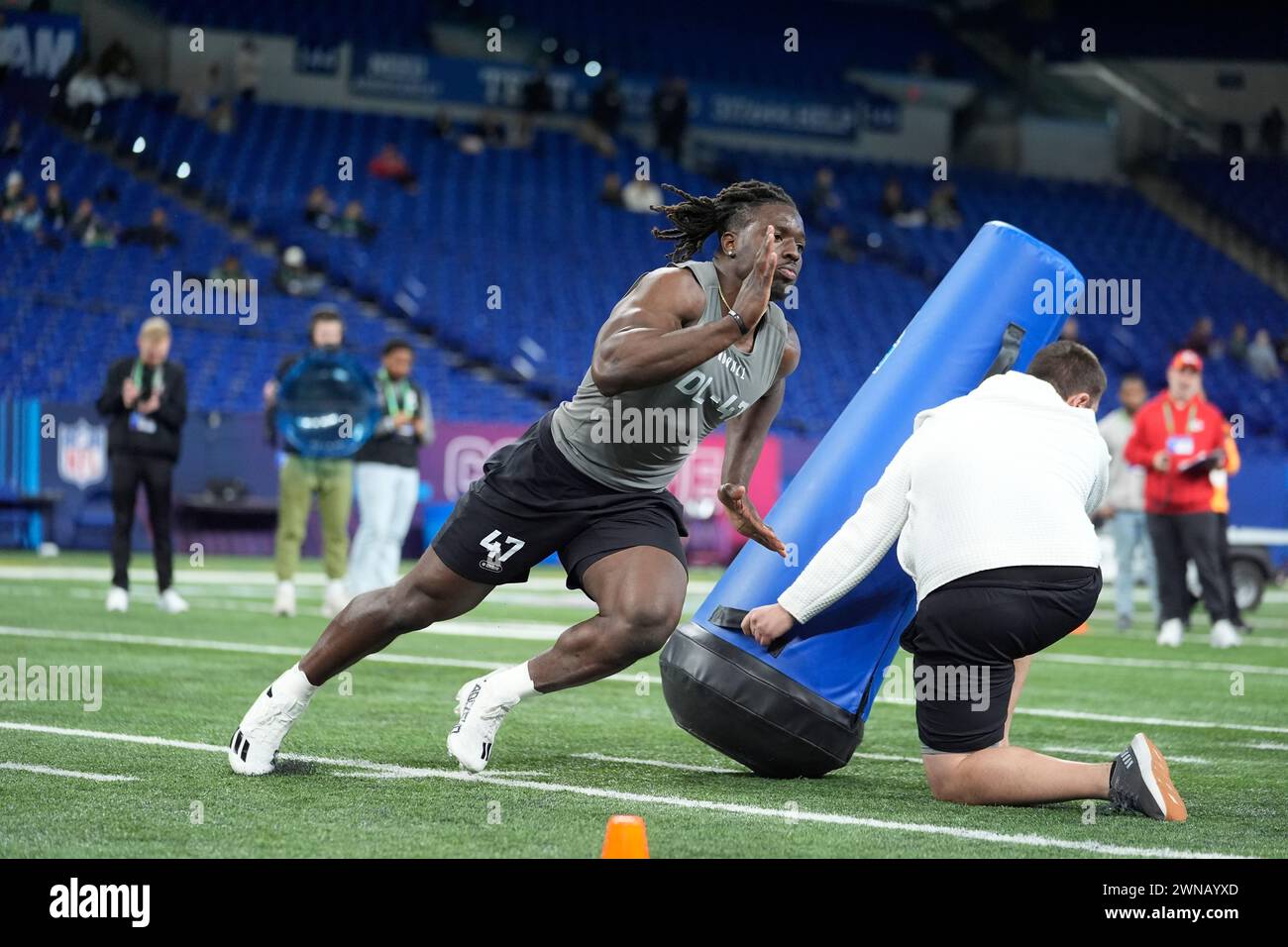 Troy defensive lineman Javon Solomon runs a drill at the NFL football ...