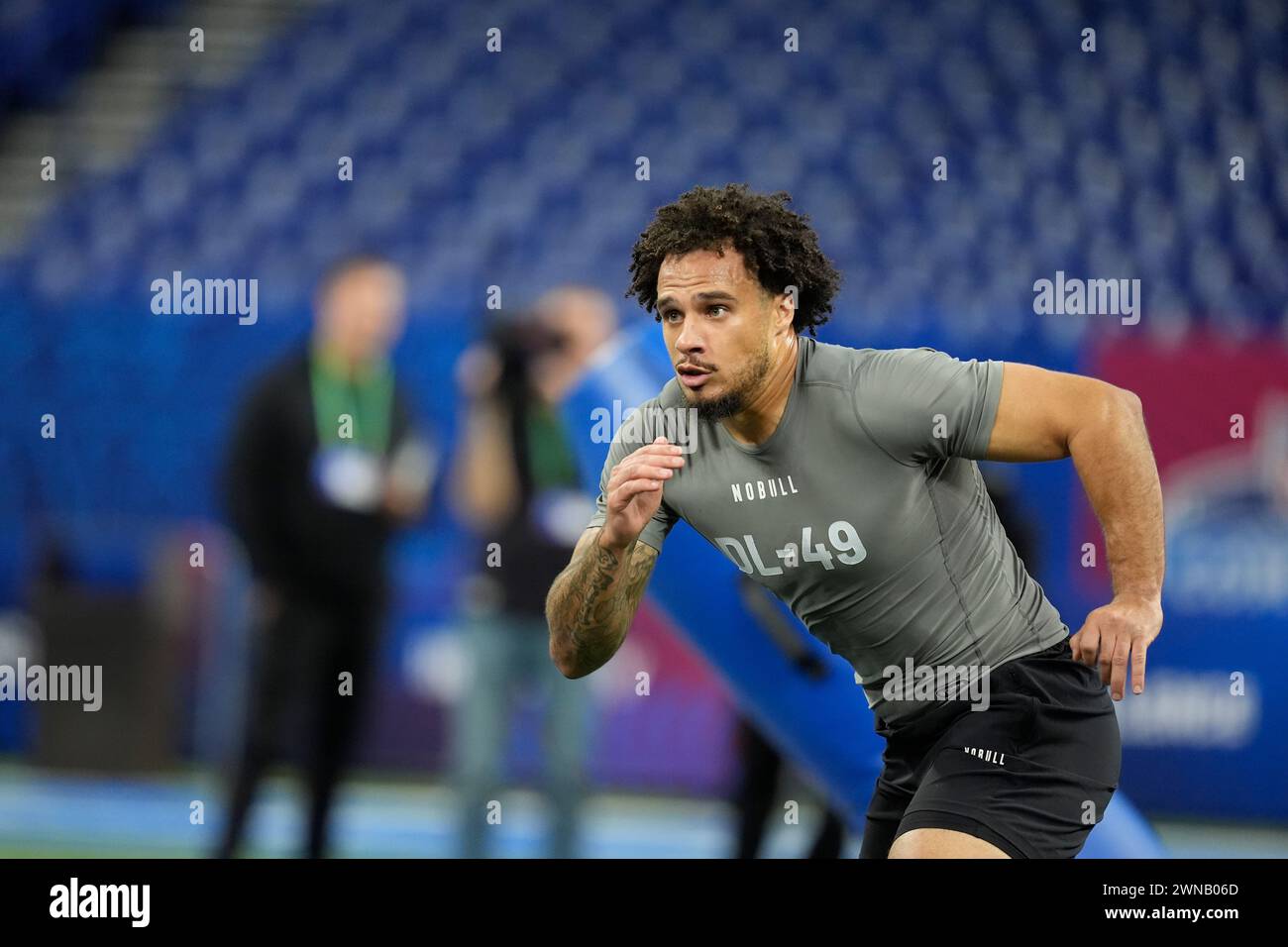 Washington defensive lineman Bralen Trice runs a drill at the NFL ...
