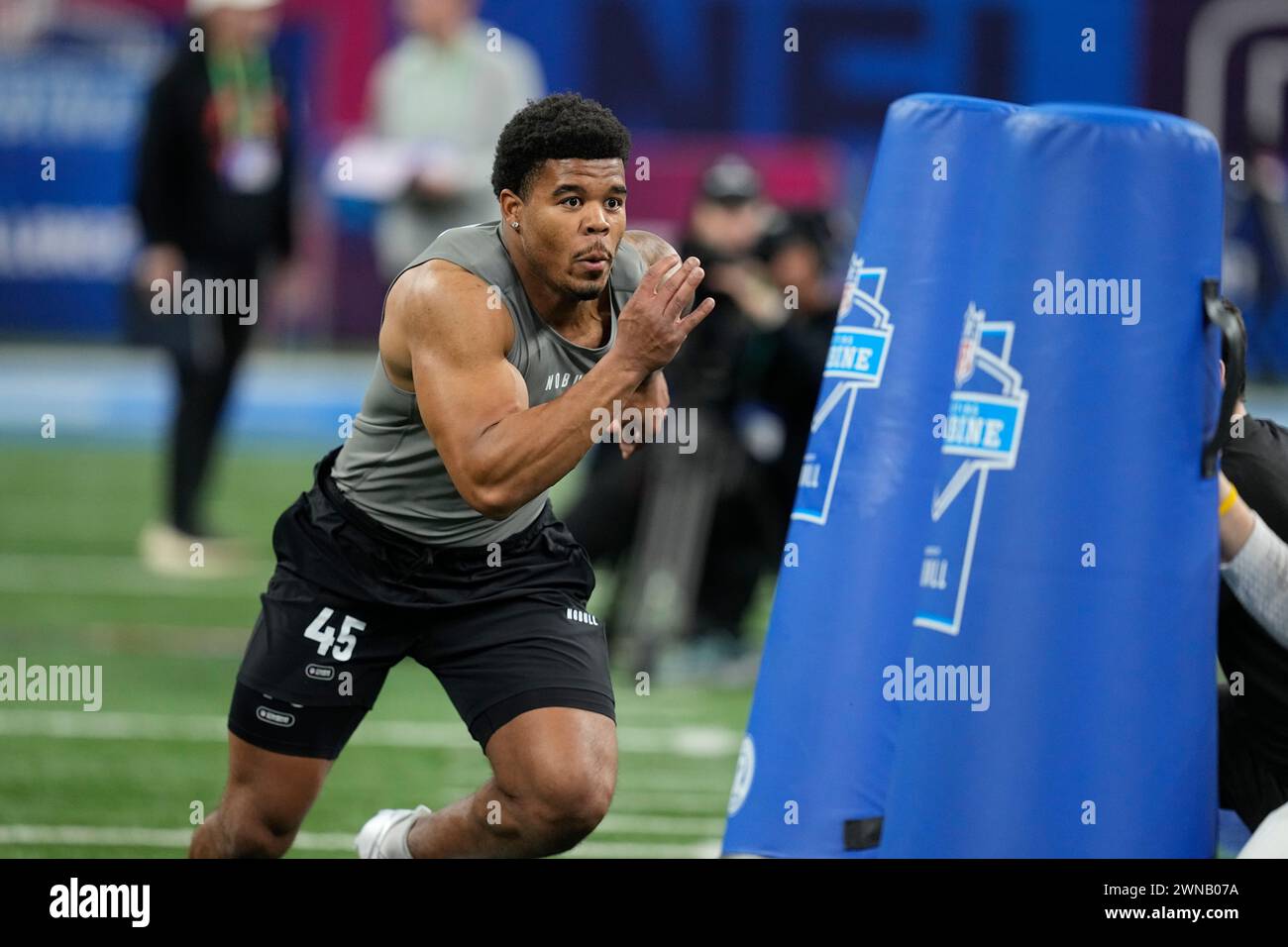 Penn State defensive lineman Chop Robinson runs a drill at the NFL ...
