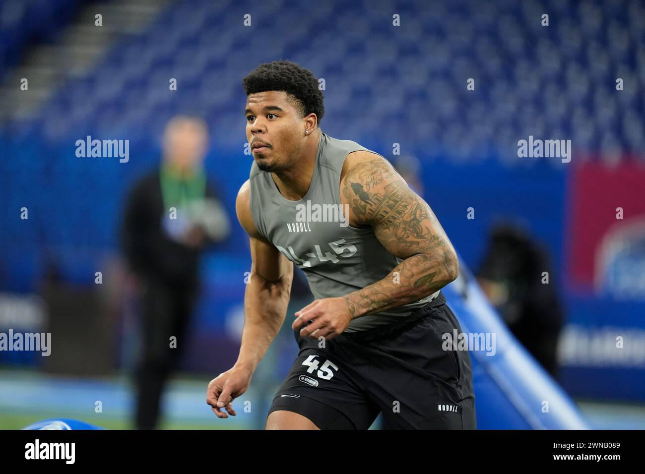 Penn State defensive lineman Chop Robinson runs a drill at the NFL ...