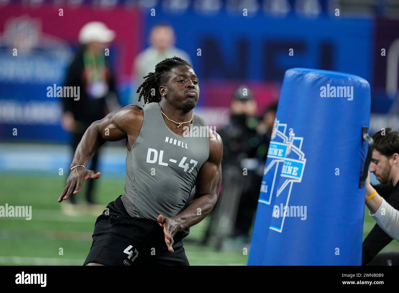 Troy defensive lineman Javon Solomon runs a drill at the NFL football ...