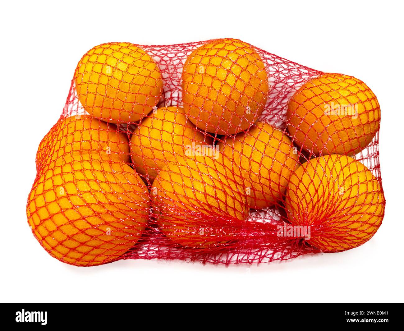 Oranges in plastic net isolated on white with clipping path. Oranges ...