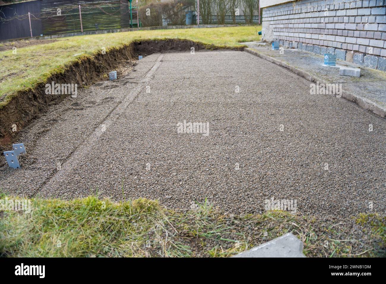 Leveling the area of land from a small stone, for laying paving slabs ...
