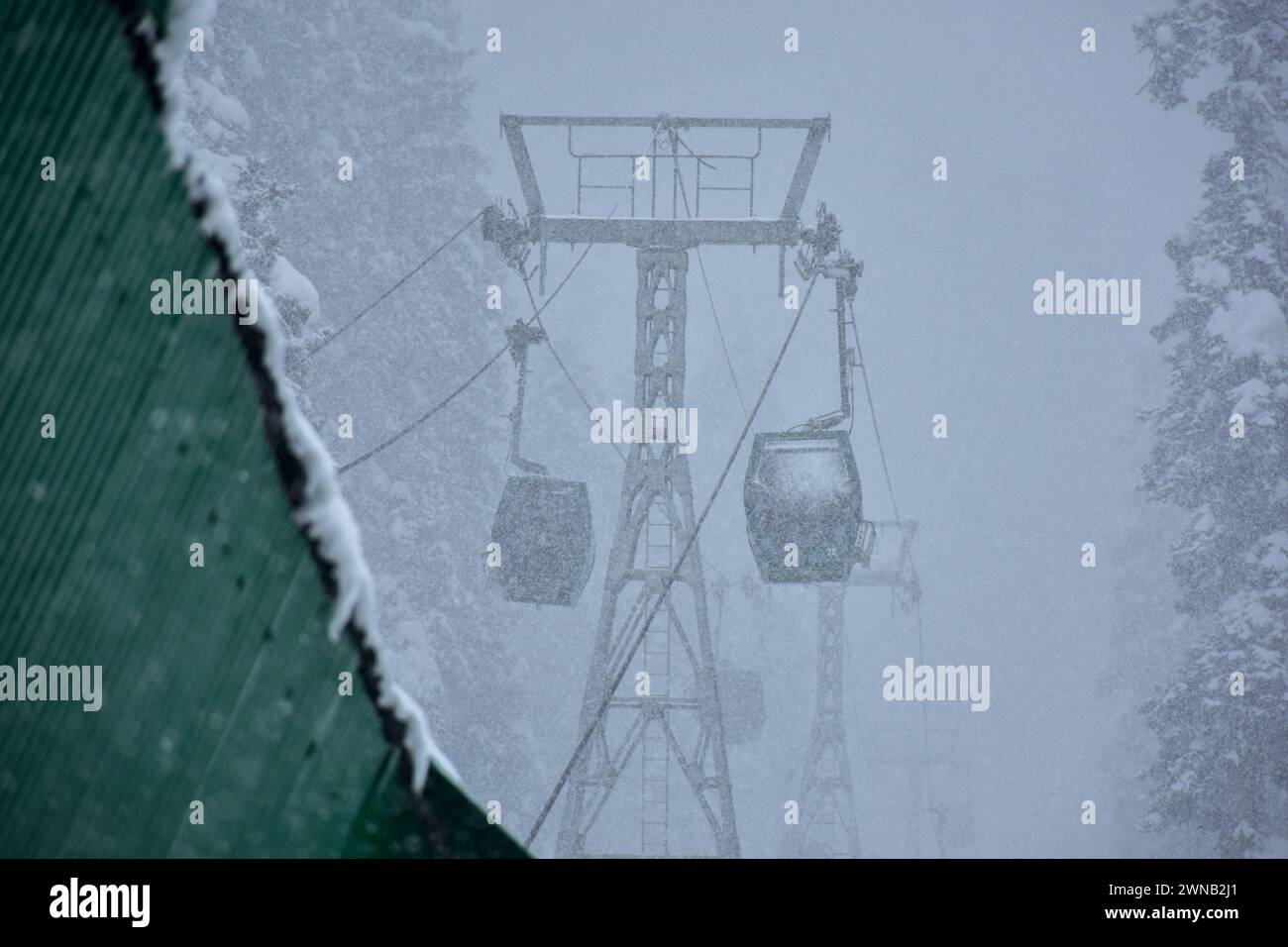 General view of cable car or Gondola during heavy snowfall in Gulmarg ...