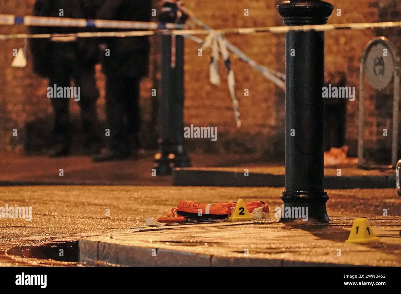 A police cordon at the scene of a shooting in Clapham, London. Three ...