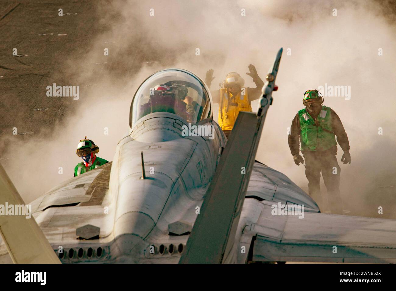 ATLANTIC OCEAN (Feb. 15, 2024) Sailors position an F/A-18E Super Hornet ...