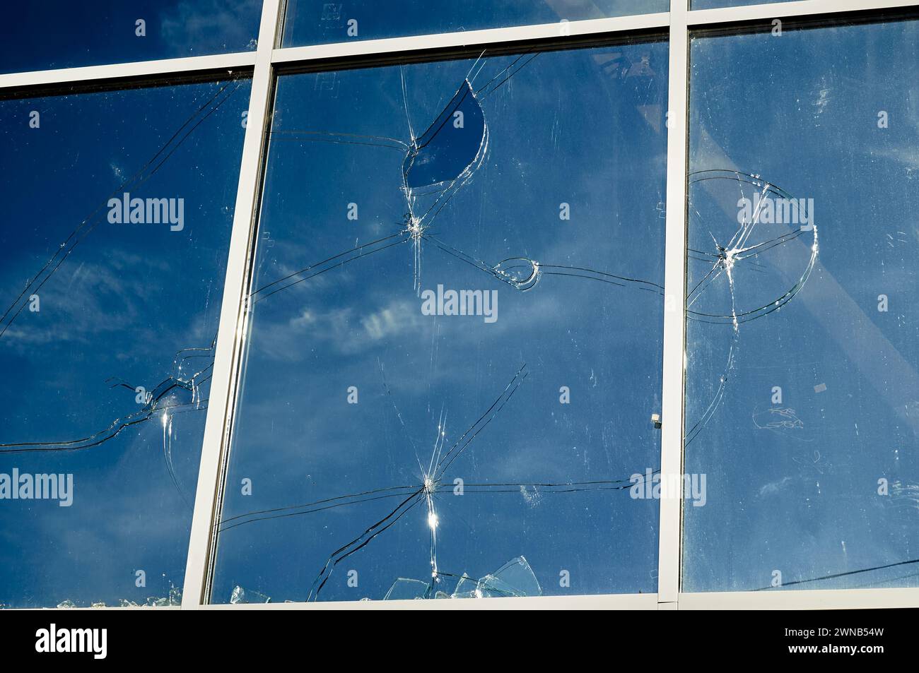 Broken office window Stock Photo - Alamy